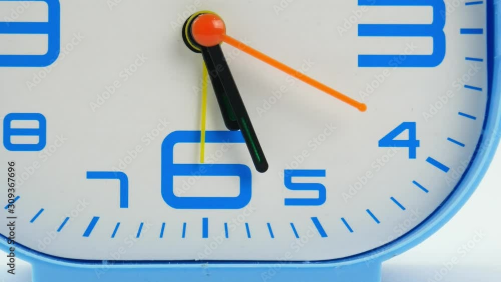 Close up Move the camera angle from left to right, Blue Alarm clock ...