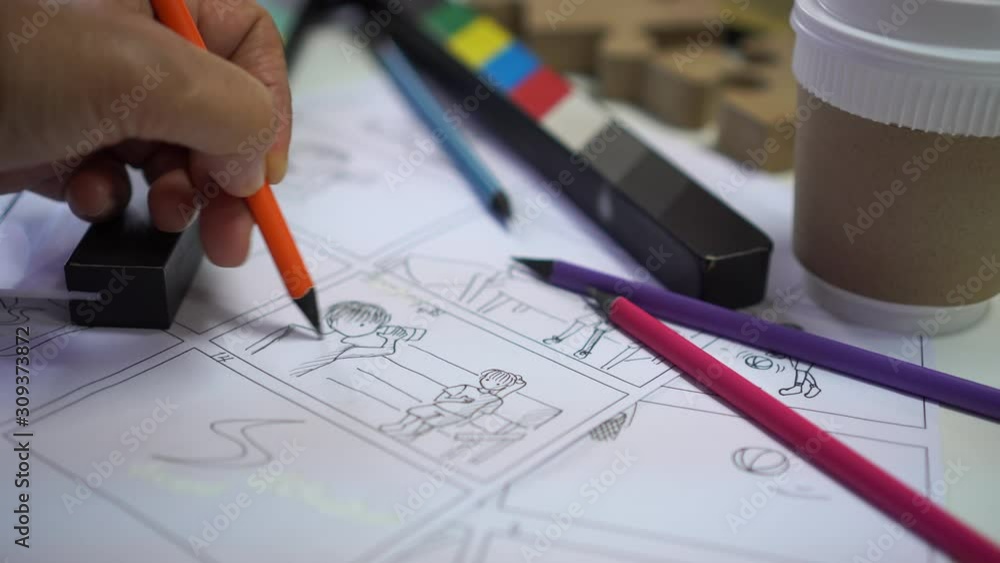 Designer creative drawing in storyboard for film movie, Video Pre ...