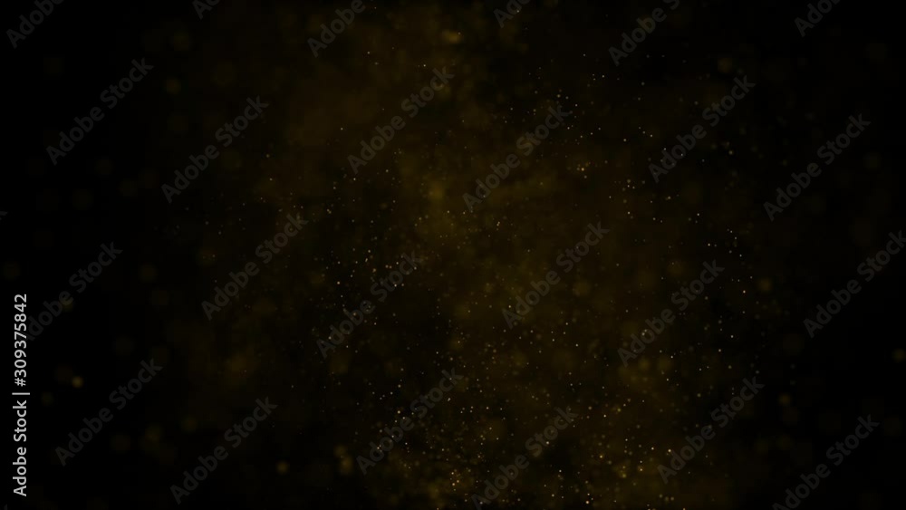 A large cluster of gold colored microparticles on a black background HD ...