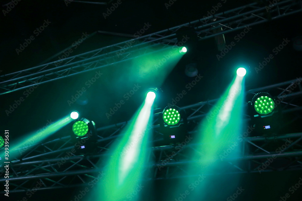 projector spotlight green color on smoke texture . light beam screening ...