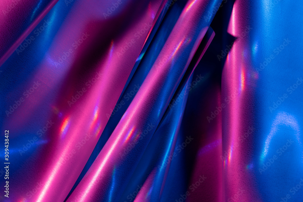 Reflection of light on holographic foils with neon lighting Stock Photo ...