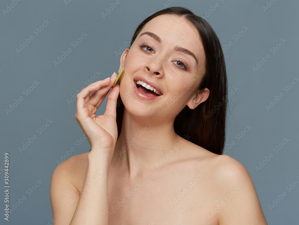 How to do Gua Sha face and neck Stock Photo | Adobe Stock