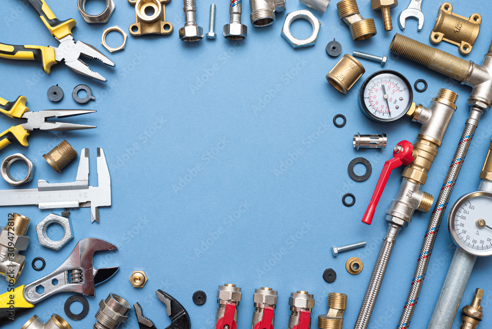 Plumbing flat lay background with copy space. Work tools and pipeline ...