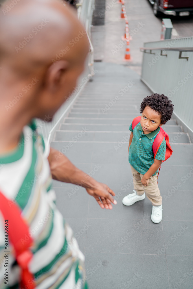 Little boy angry at his father Stock Photo | Adobe Stock