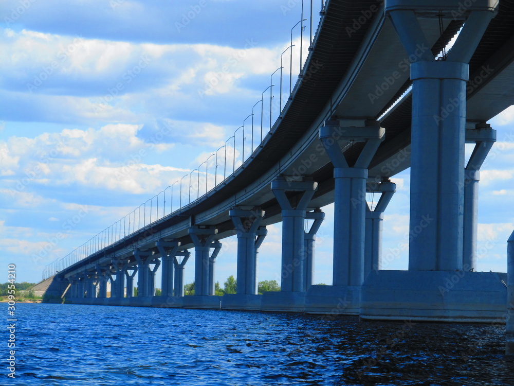 Bridges over a frozen river. Bridge piers. Bridge interchange on sky ...