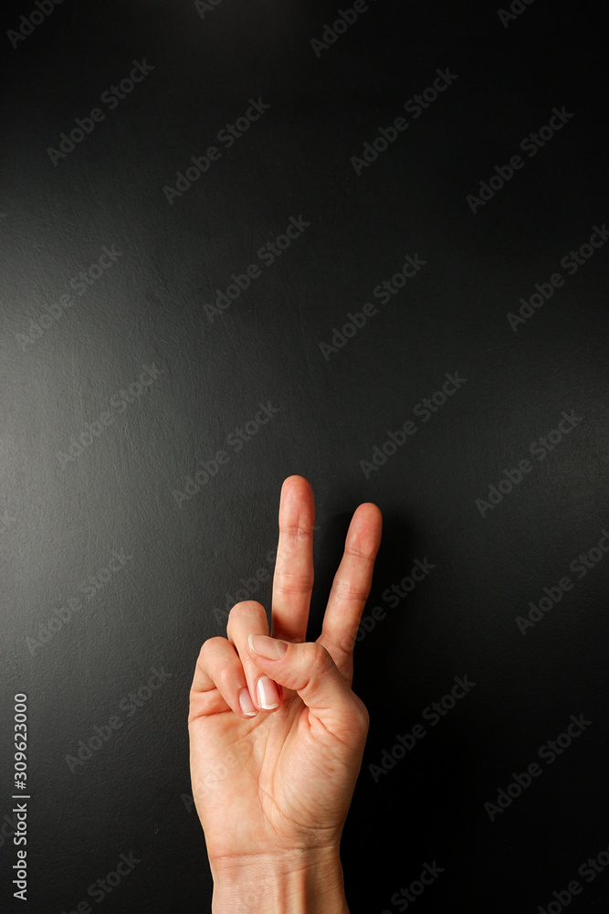 Hand gestures. Two fingers up, index and middle, V sign Stock Photo ...