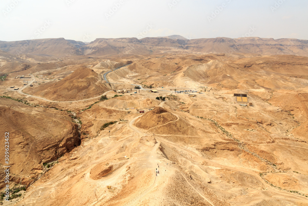 Roman Ramp at fortress Masada and Panorama of Judaean Desert mountains ...