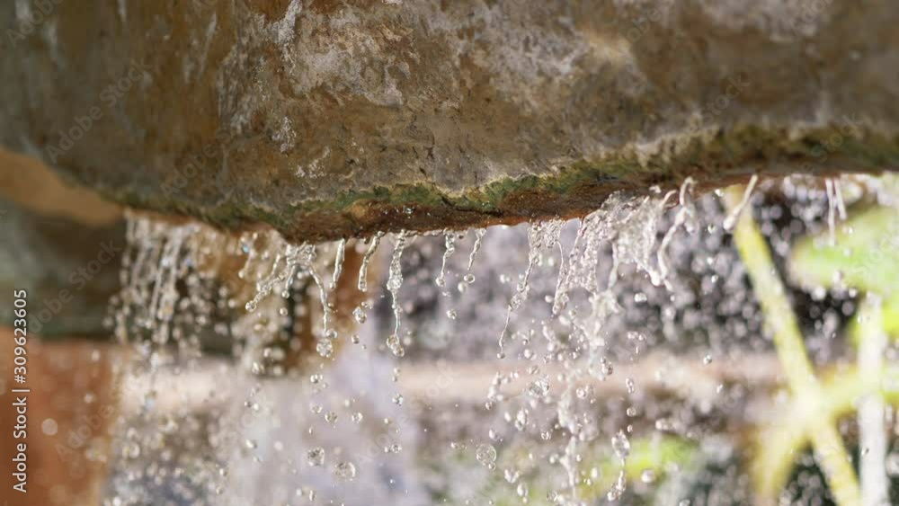 Water drops falling from rock in 4k slow motion 60fps Stock-Video ...