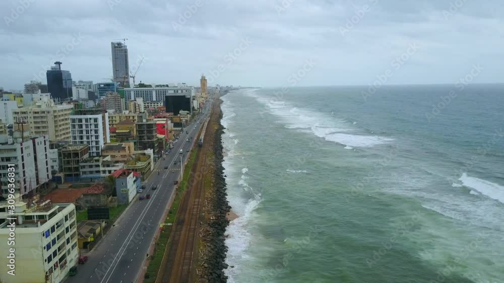 Aerial view of ocean wave reaching the coastline in Colombo, Sri Lanka ...
