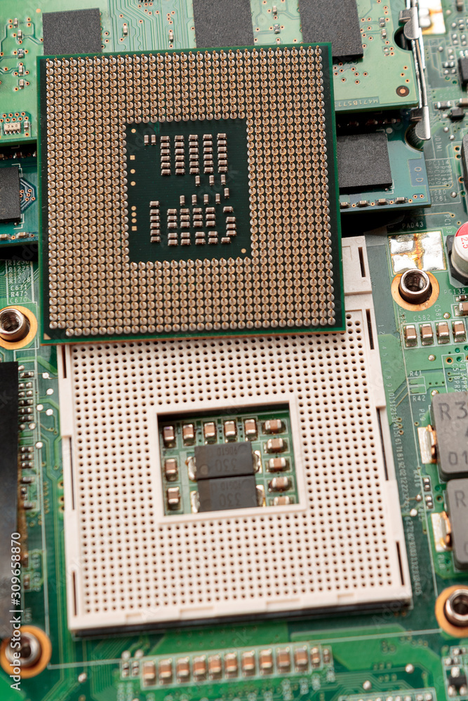 computer CPU close-up on the motherboard background, socket of central ...