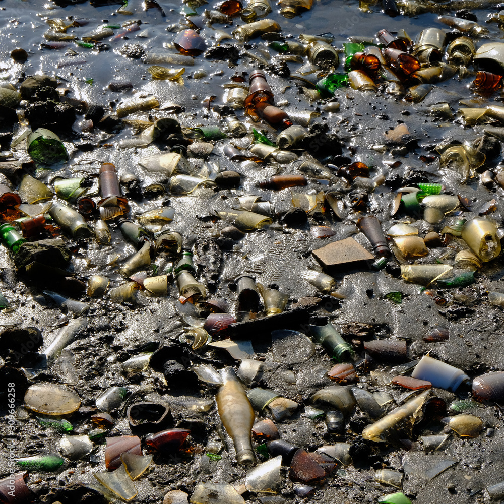 Washed up Bottles, Glass and other Debris on the beach at Dead Horse ...