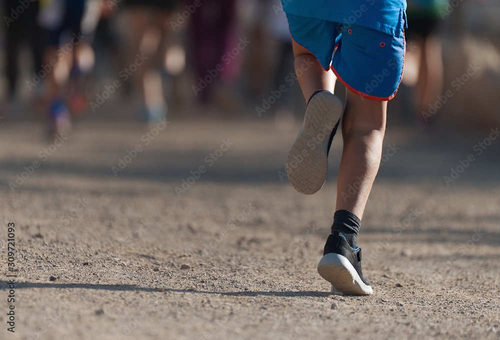 Running children, young athletes run in a kids run race,running on city ...