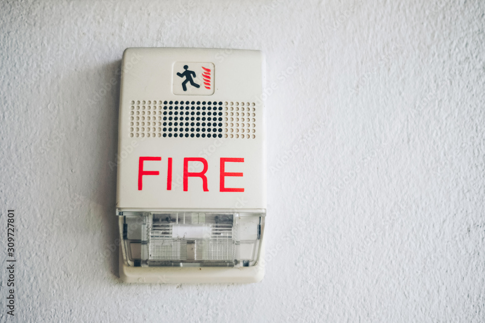 fire alarm switch on wall. Electrical Conduit & PVC Conduit. Closed-up ...