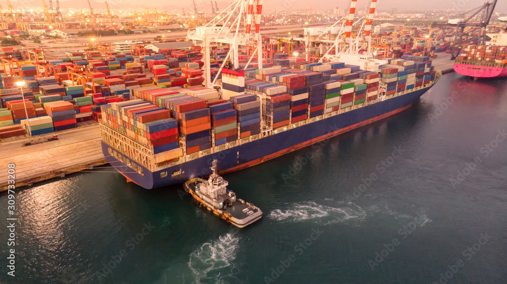 cargo container ship loanding cargo crane at the international terminal ...