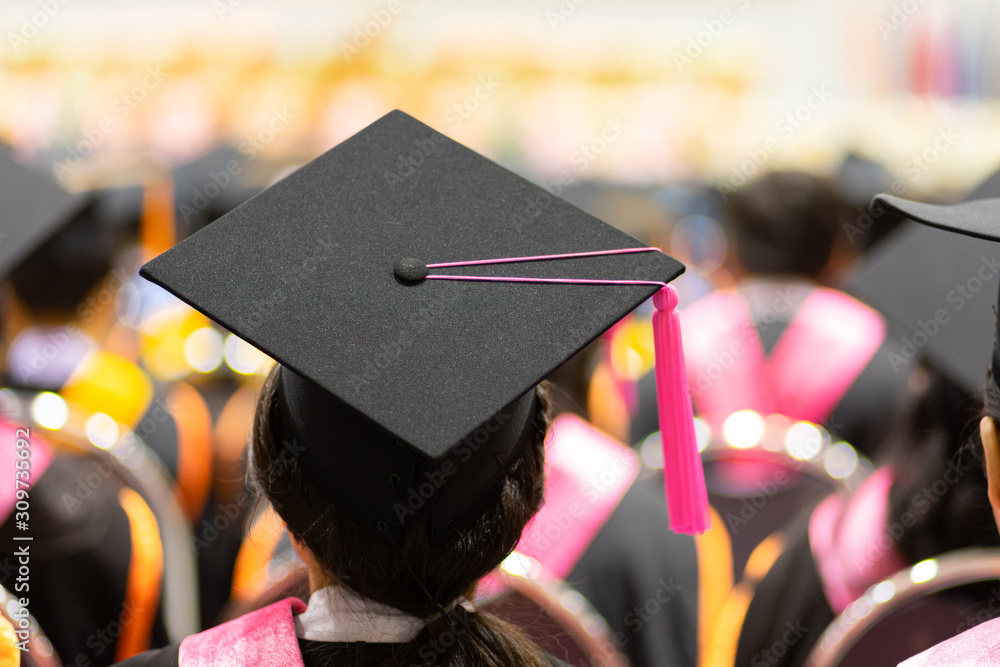 Poster Rear view and soft selective focus of the graduates in the ...