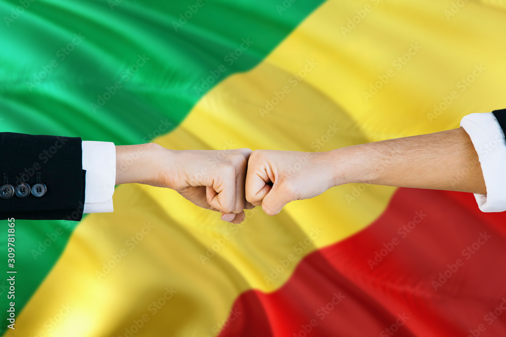 Republic Of The Congo agreement concept. Man and woman fist bumping on ...