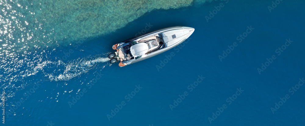 Aerial drone ultra wide top down photo of luxury rigid inflatable speed ...