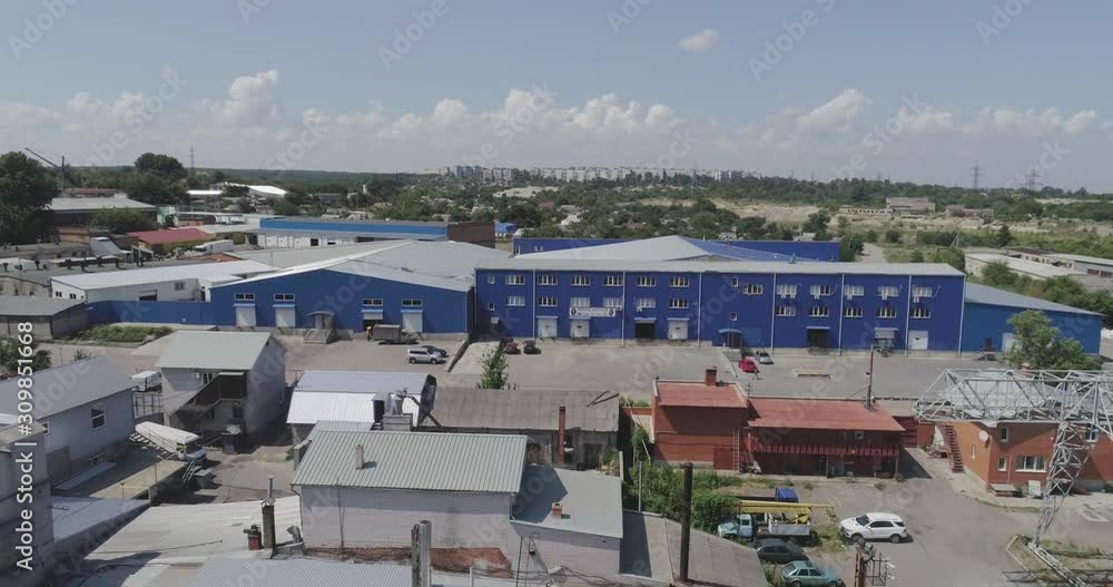 A modern factory or commercial building, the exterior of a modern ...