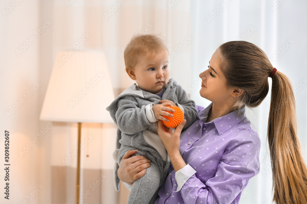 Teen nanny with cute little baby at home Stock Photo | Adobe Stock