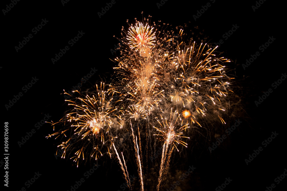 Gold fireworks on black background for winter and new year festivals ...