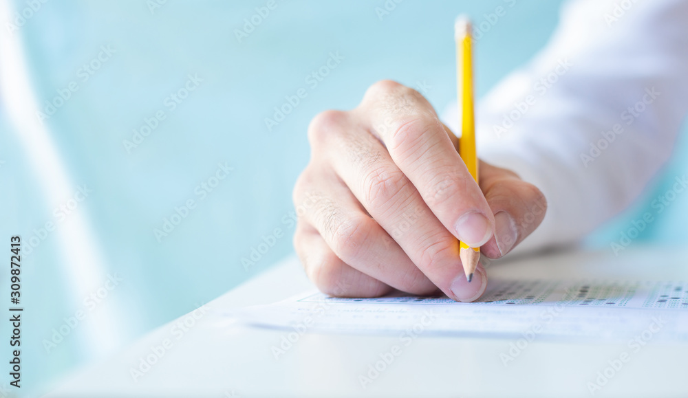 high school,university student study.hands holding pencil writing paper ...