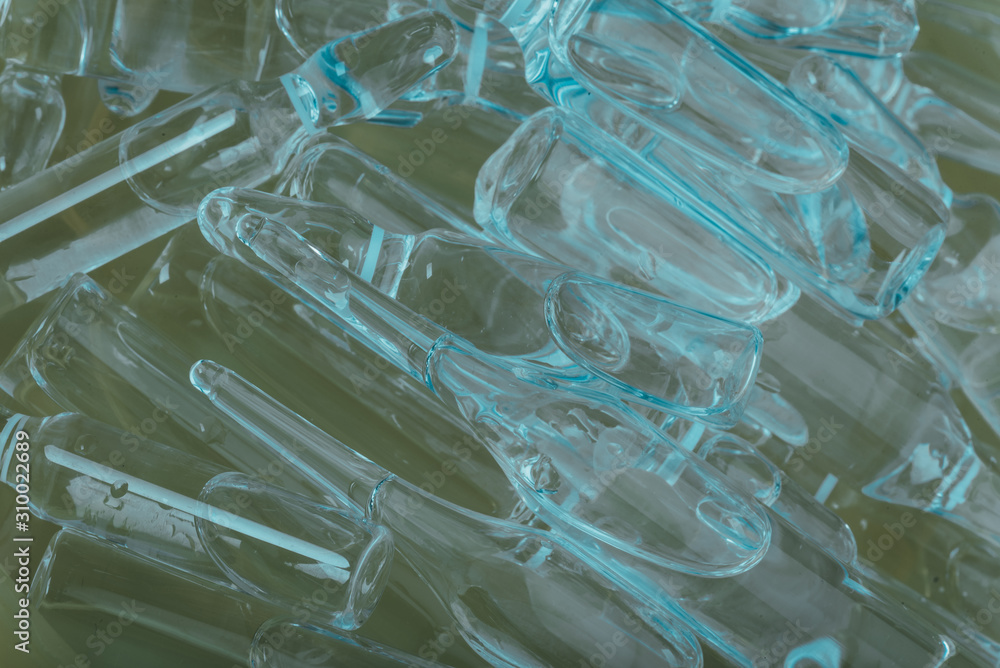 Glass medical ampoule vial for injection. Medicine is liquid sodium ...