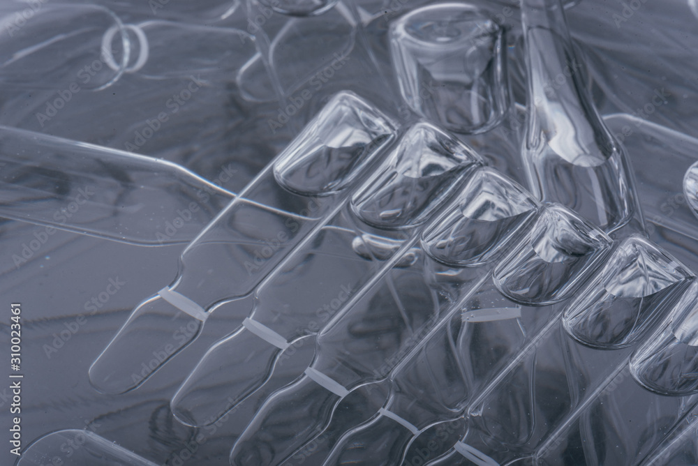 Glass medical ampoule vial for injection. Medicine is liquid sodium ...