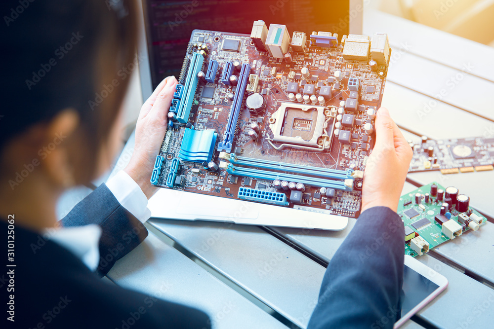 Engineer inspect final production of Printed circuit computer logic ...