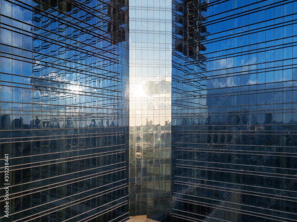 Reflection on a glass facade of office building Stock Photo | Adobe Stock