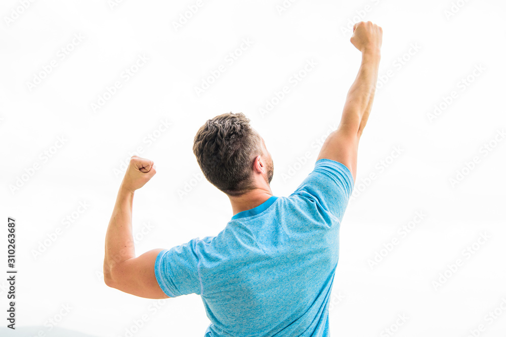 Strong muscular body feeling powerful rear view. Successful athlete ...