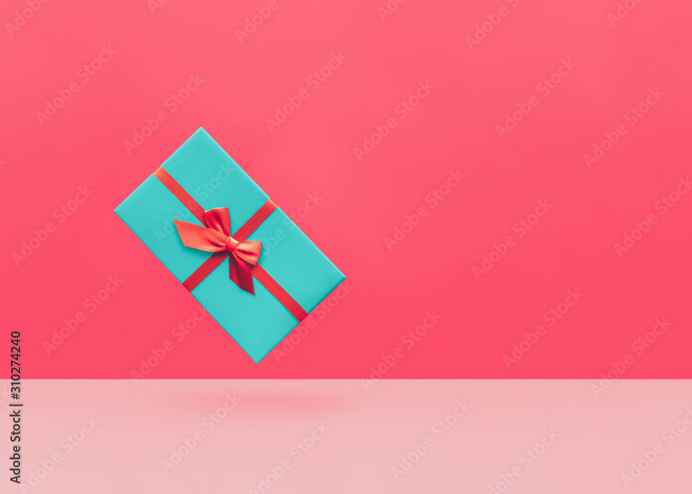 Gift box Design template with copy space Light blue gift box is hanging ...