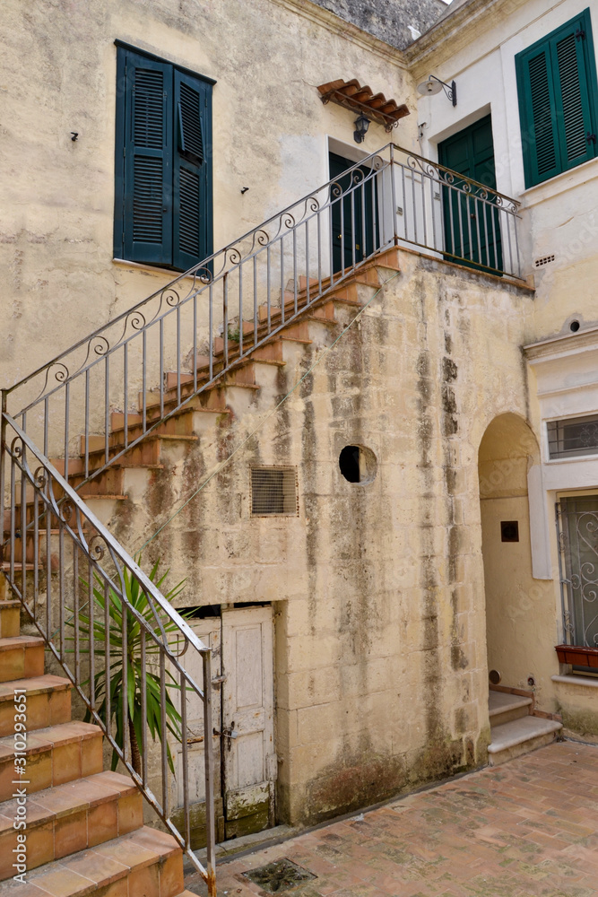 scale con ringhiera con finestre e archi Stock Photo | Adobe Stock