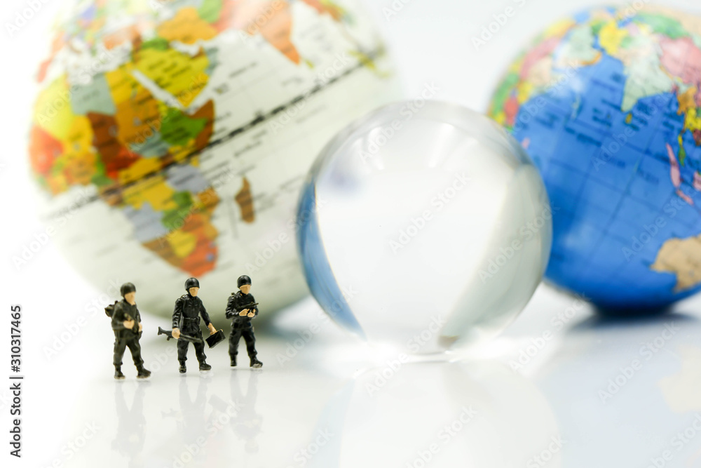 Miniature people : soldiers team with world map,War, army, military ...