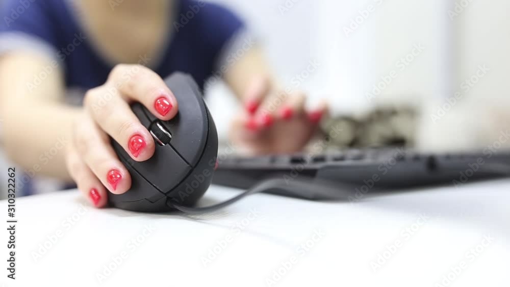 girl's hand uses a vertical ergonomic computer mouse joystick. Stock ...