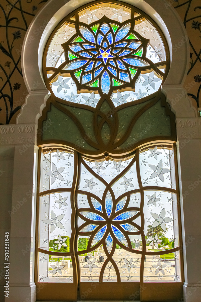 Abu Dhabi, United Arab Emirates - April 22, 2013: Stained glass window ...
