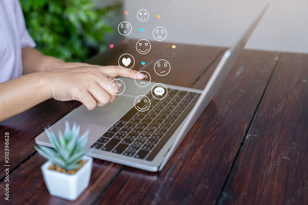 Person using a social media marketing concept on computer tablet with ...