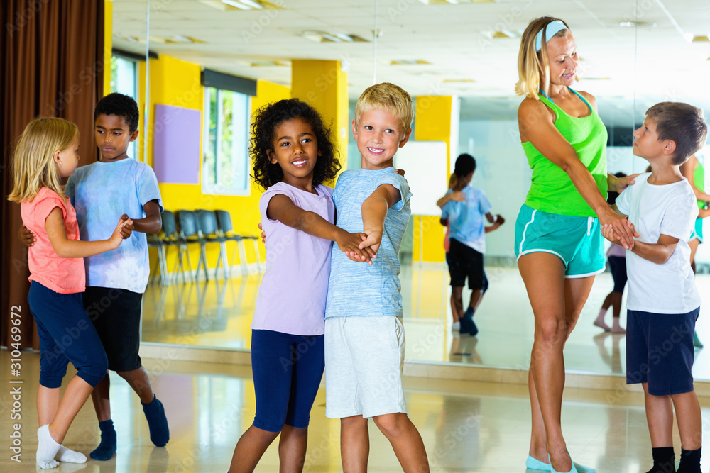 Children dancing together slow ballroom dances in pairs in chore Stock ...