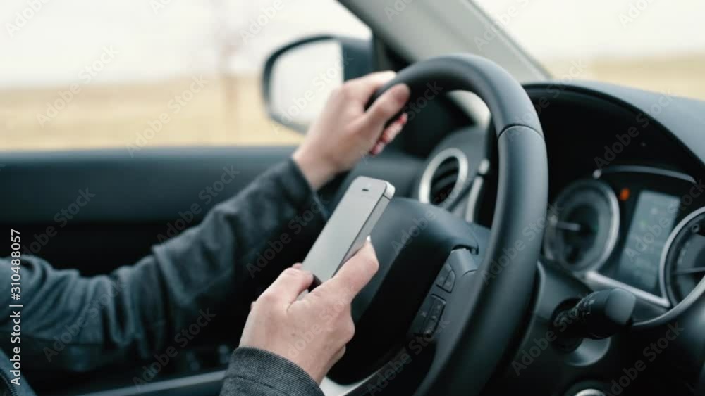 Texting and driving is dangerous behavior in traffic Stock Video ...