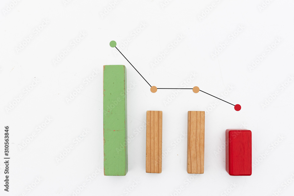 Simple wooden toy block financial bar chart graph with downward trend ...