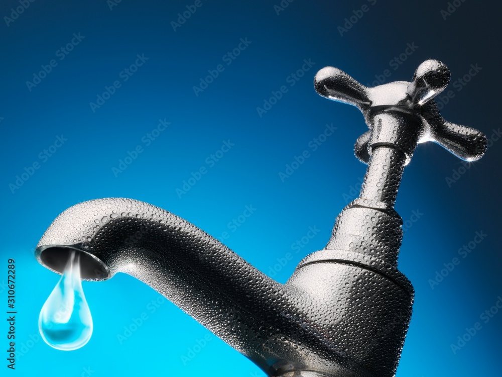 Drop of water trickling from tap close-up (digital composite) Stock ...
