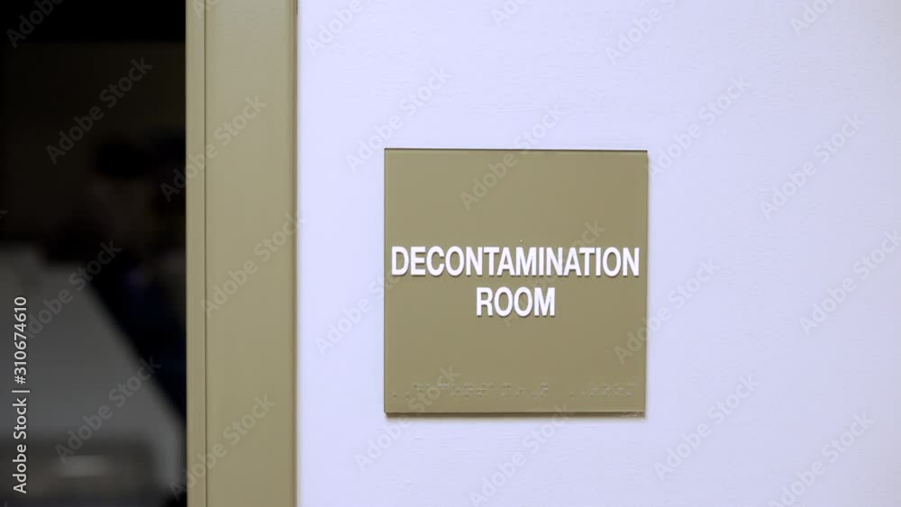 Decontamination room Sign on wall in medical office hospital. slider ...
