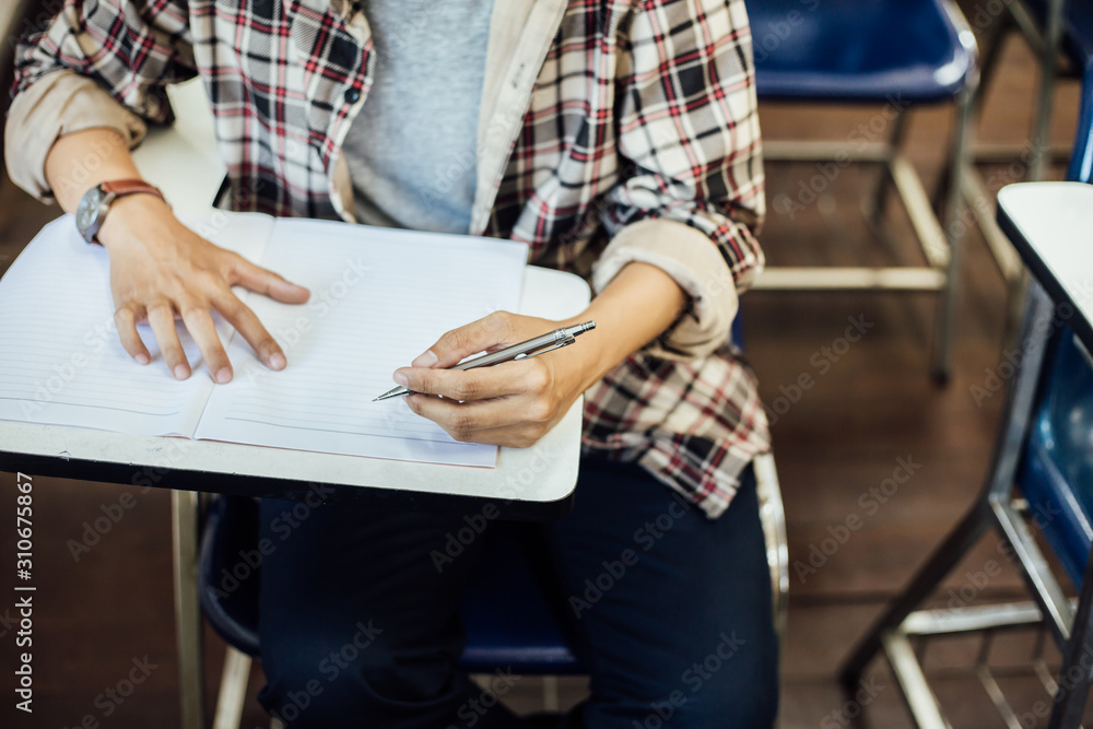 high school,university student study.hands holding pencil writing paper ...