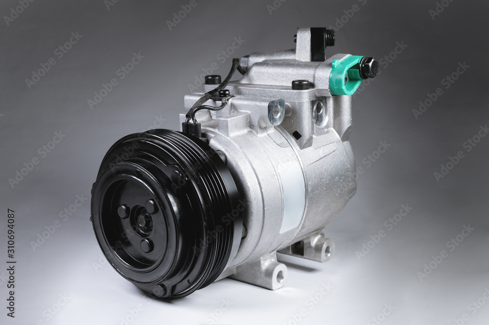 Close-up New car air conditioning compressor on grey background Stock ...