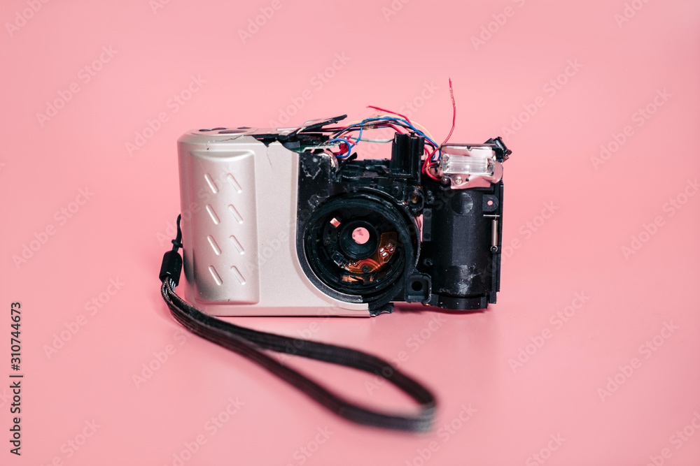 Destroyed compact camera Stock Photo | Adobe Stock