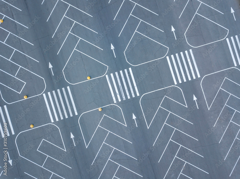 Foto de Diagonal road marking, empty parking lot for cars with painted ...