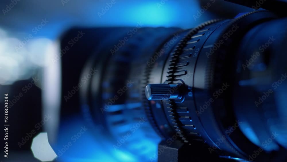 Camera lens with zoom ring moving, close up. Turning zoom ring of ...