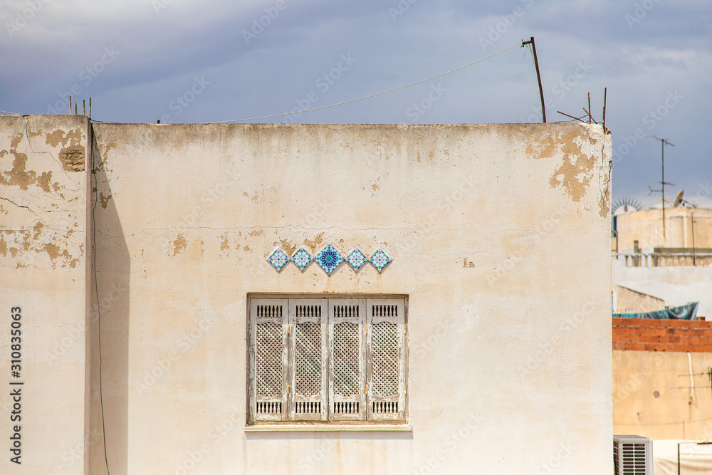 Tunisian architecture. Big square wooden window decorated with cute ...