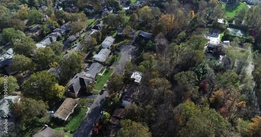 Iconic 4K aerial of a typical American suburbs neighborhood in summer ...