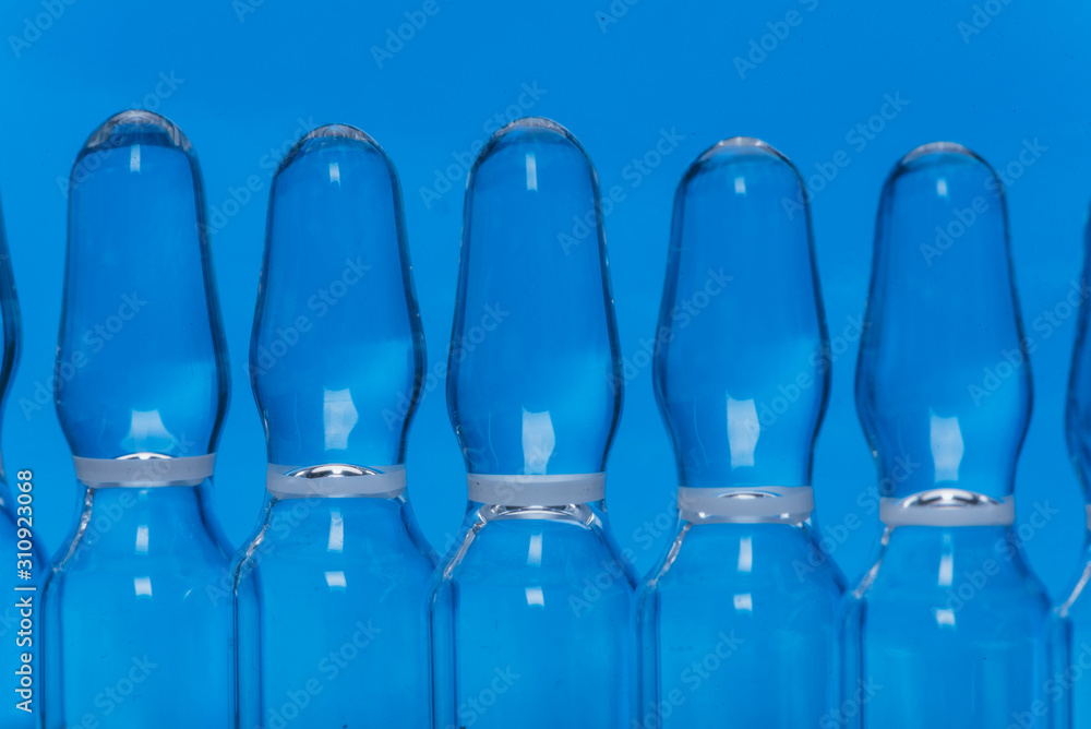 Glass medical ampoule vial for injection. Medicine is liquid sodium ...