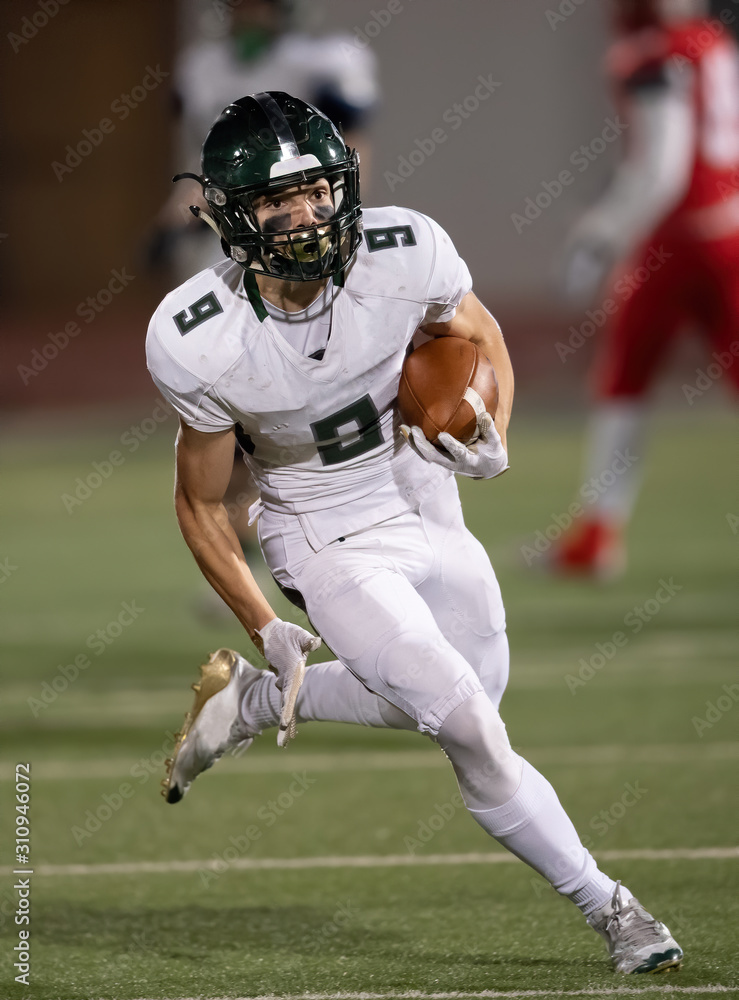 Action photos of football players making amazing plays during a ...